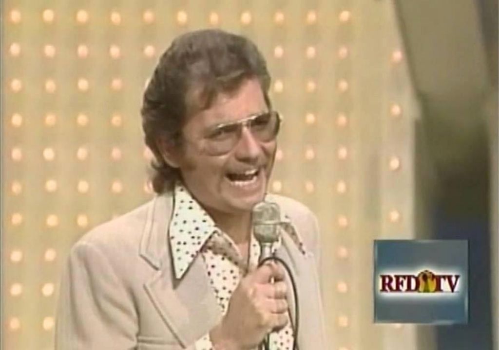 Swinging with the Joyful Groove of "Pop Goes the Country Theme Song" by ...